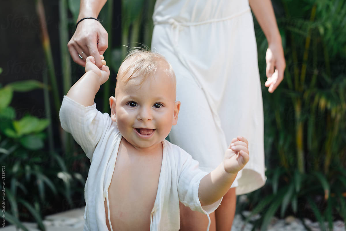 "Happy Child Walking Outdoor In A Tropical Garden." by Stocksy ...