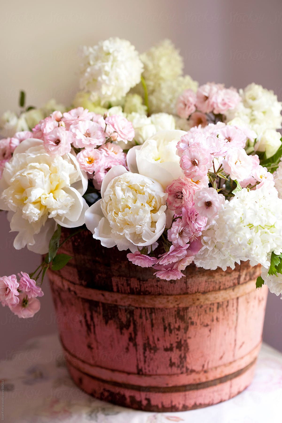 "Bucket Of Flowers" by Stocksy Contributor "Susan Findlay" - Stocksy