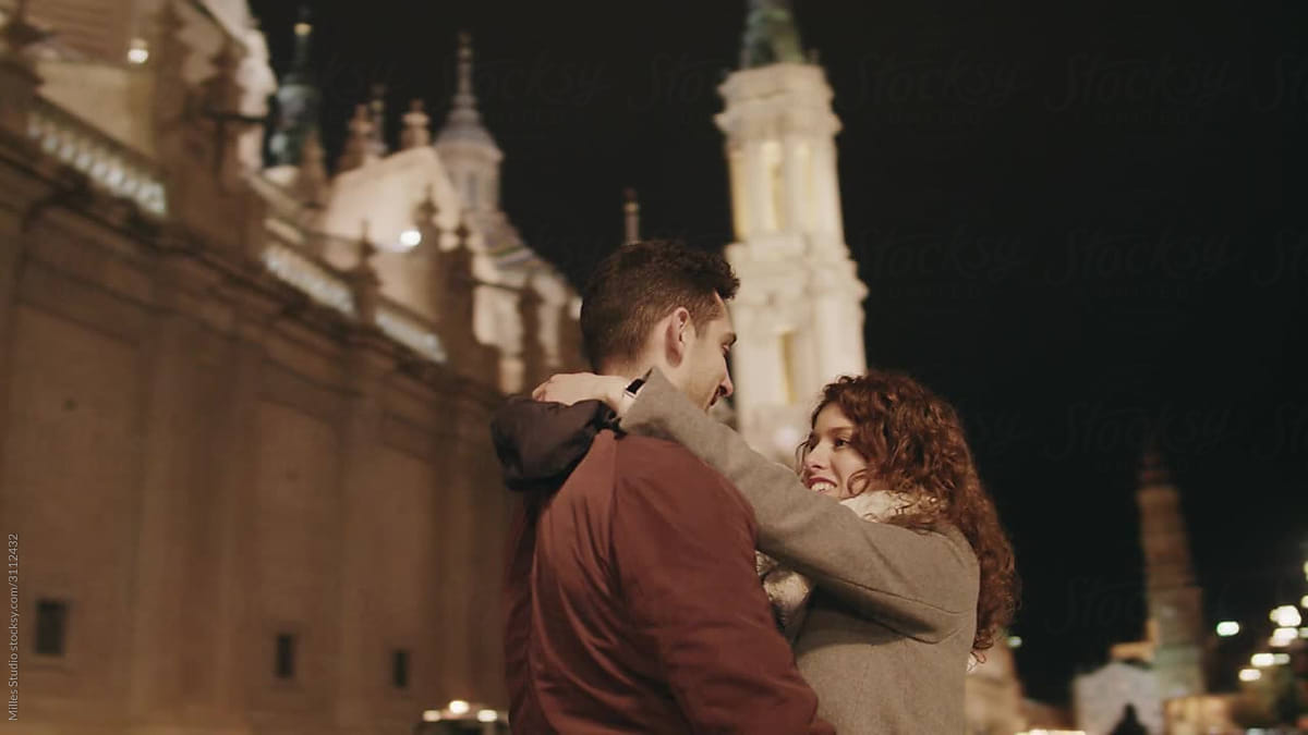 "Happy Couple Spinning Around And Kissing At Night" by Stocksy ...