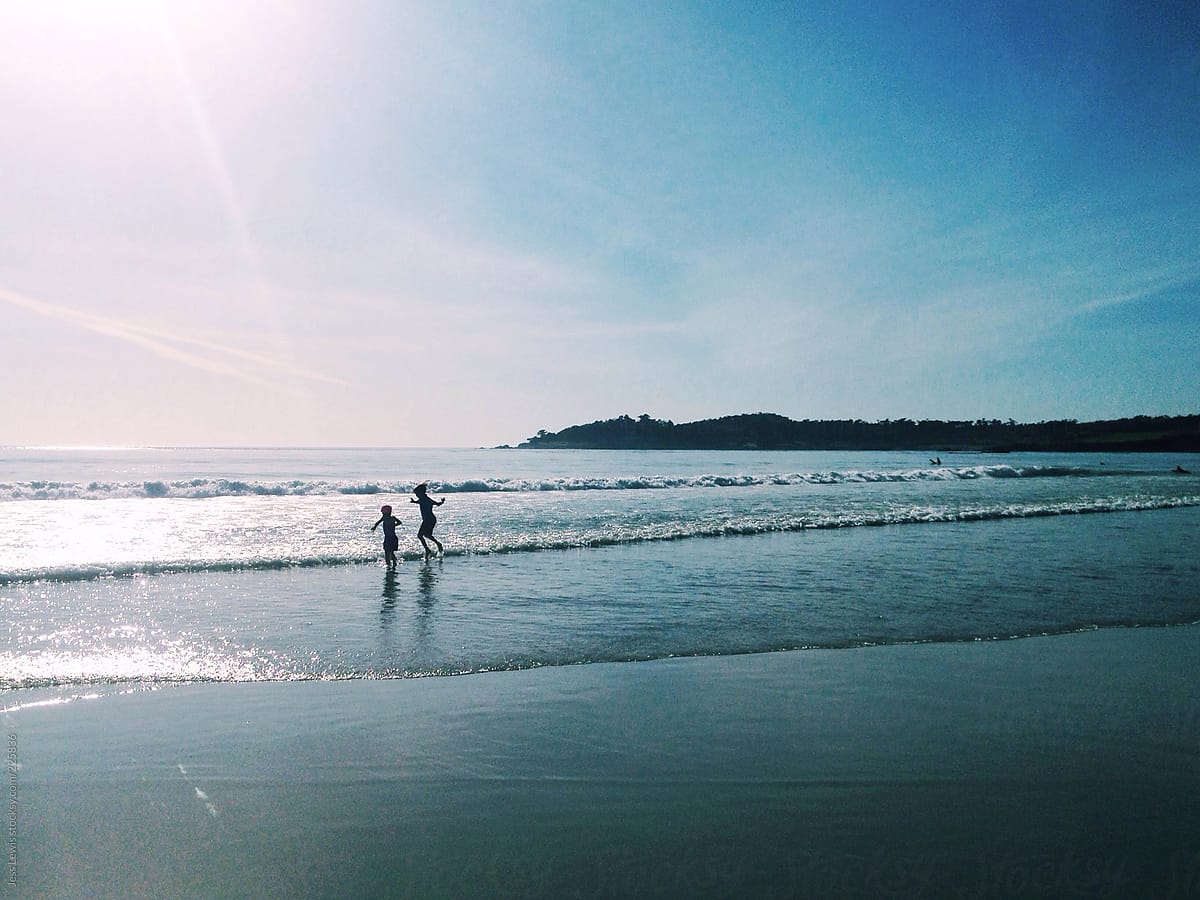"Two Children Jumping Into Ocean" by Stocksy Contributor "Jess Lewis ...
