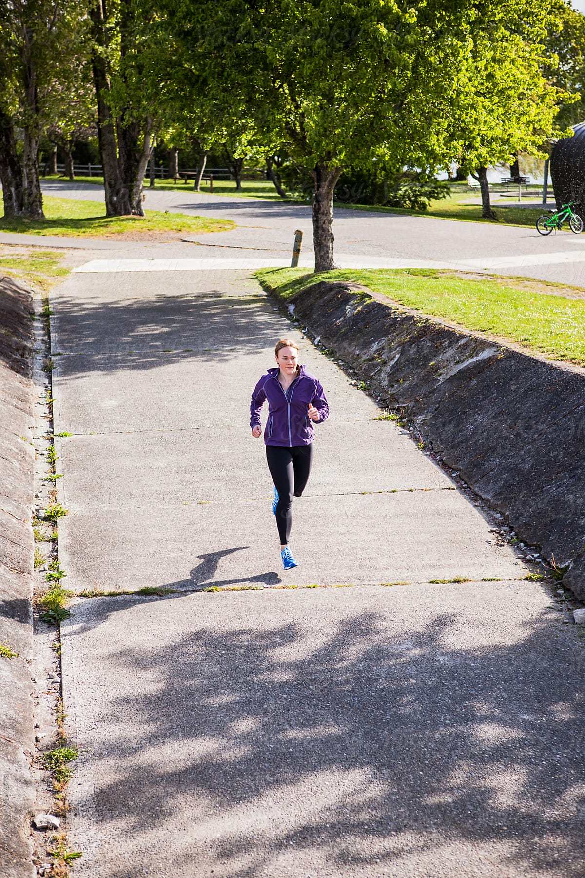 "Female Runner Running In A Park" by Stocksy Contributor "Take A Pix ...