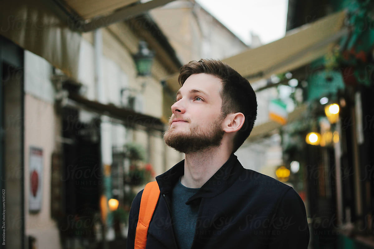 "Male Tourist In The Town" by Stocksy Contributor "Studio KME" - Stocksy