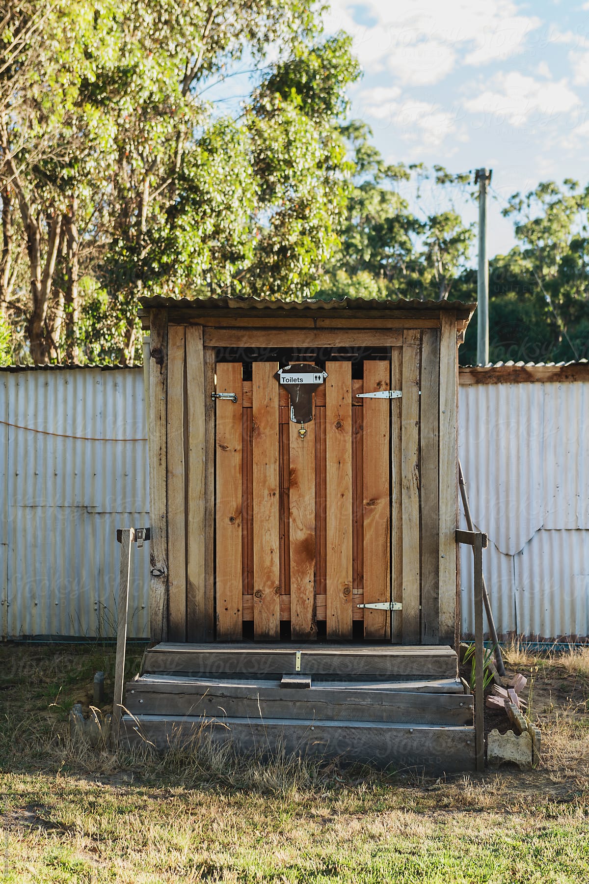 "Outdoor Toilet" by Stocksy Contributor "Gillian Vann" - Stocksy