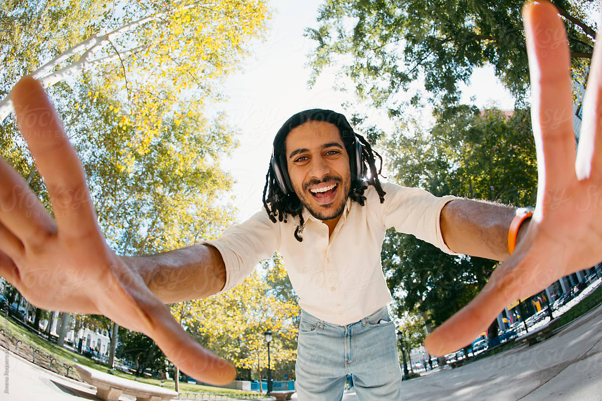 "Fisheye Portrait Of Young Cheerful Man Smiling To Camera" by Stocksy ...