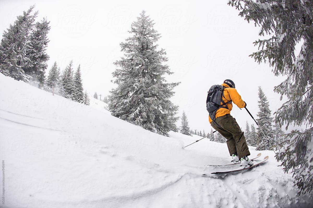 "Man Skiing Off Piste In The Woods" by Stocksy Contributor "Ibex.media ...