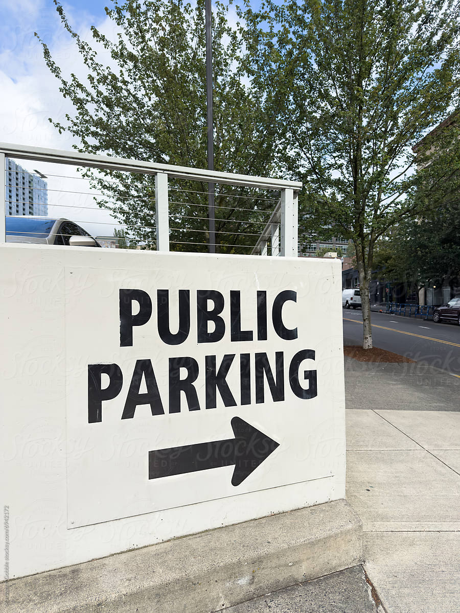 "Public Parking Sign On City Street" by Stocksy Contributor "Maryanne ...