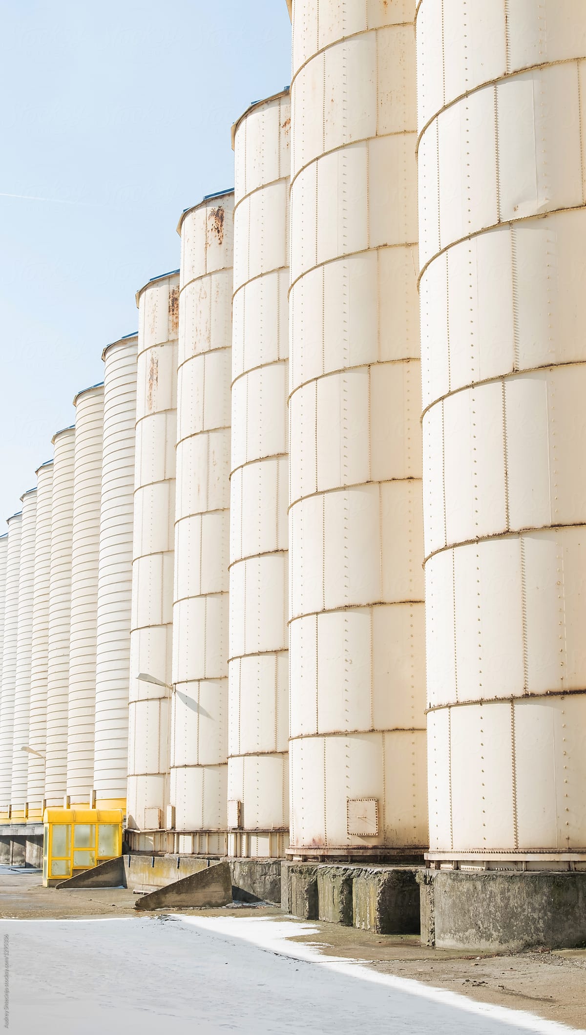 "Industrial Complex With Numbered Silos/factory Buildings." by Stocksy ...