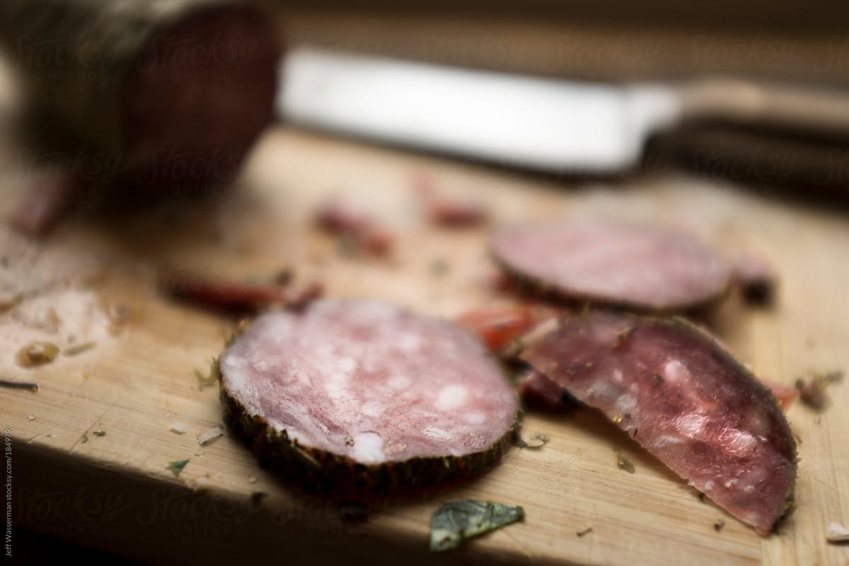 "Slice Herb Encrusted Italian Salami" by Stocksy Contributor "Jeff ...