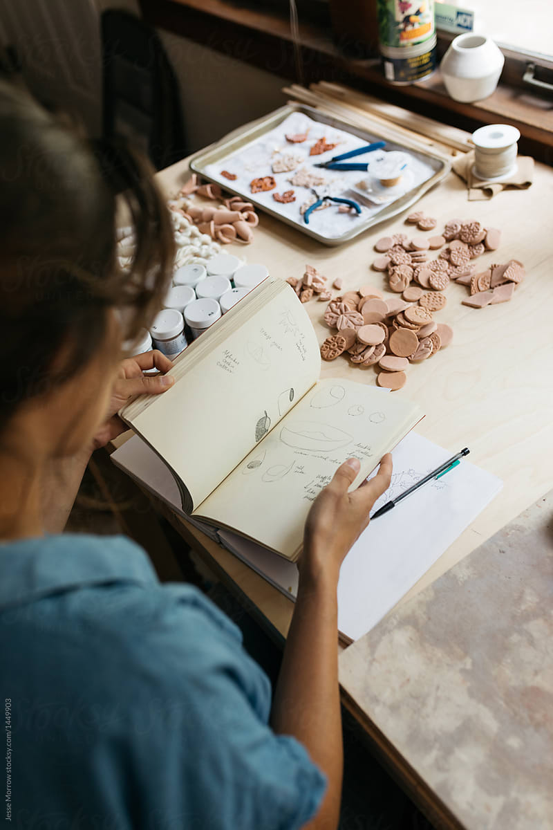 "Young Woman Working On Concepts And Sketching For Small Business ...