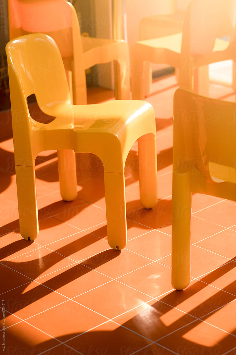 "Radiant Chairs" by Stocksy Contributor "A.J. Schokora" - Stocksy