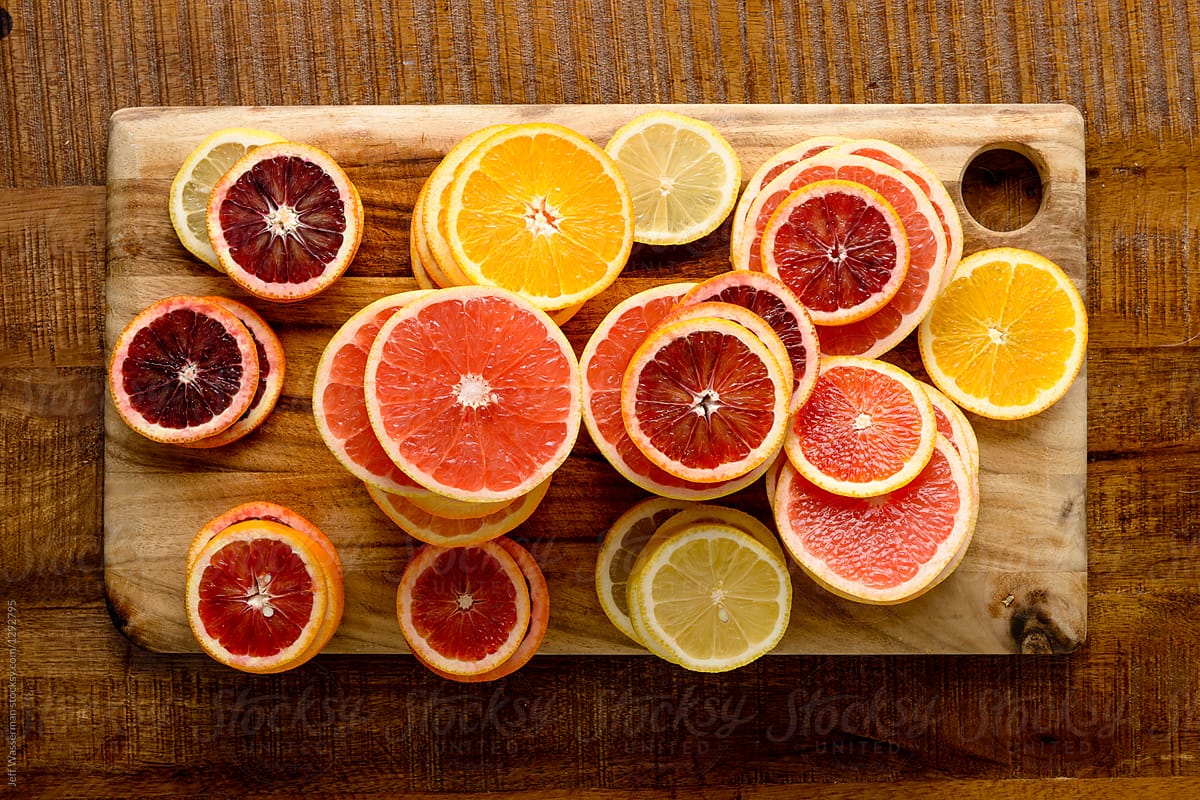 "Arrangement Of Citrus Fruit Slices" by Stocksy Contributor "Jeff ...