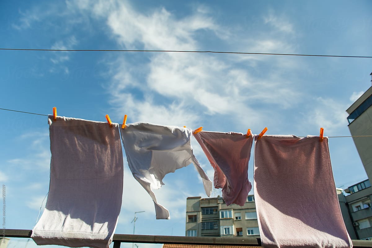 "Drying Laundry On The Clothesline" by Stocksy Contributor "Jelena ...