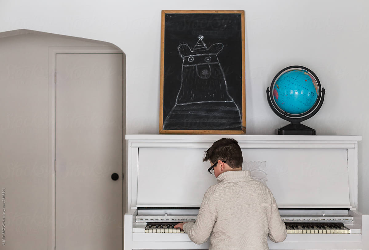 "Practicing Piano At Home" by Stocksy Contributor "ALICIA BROWN" - Stocksy