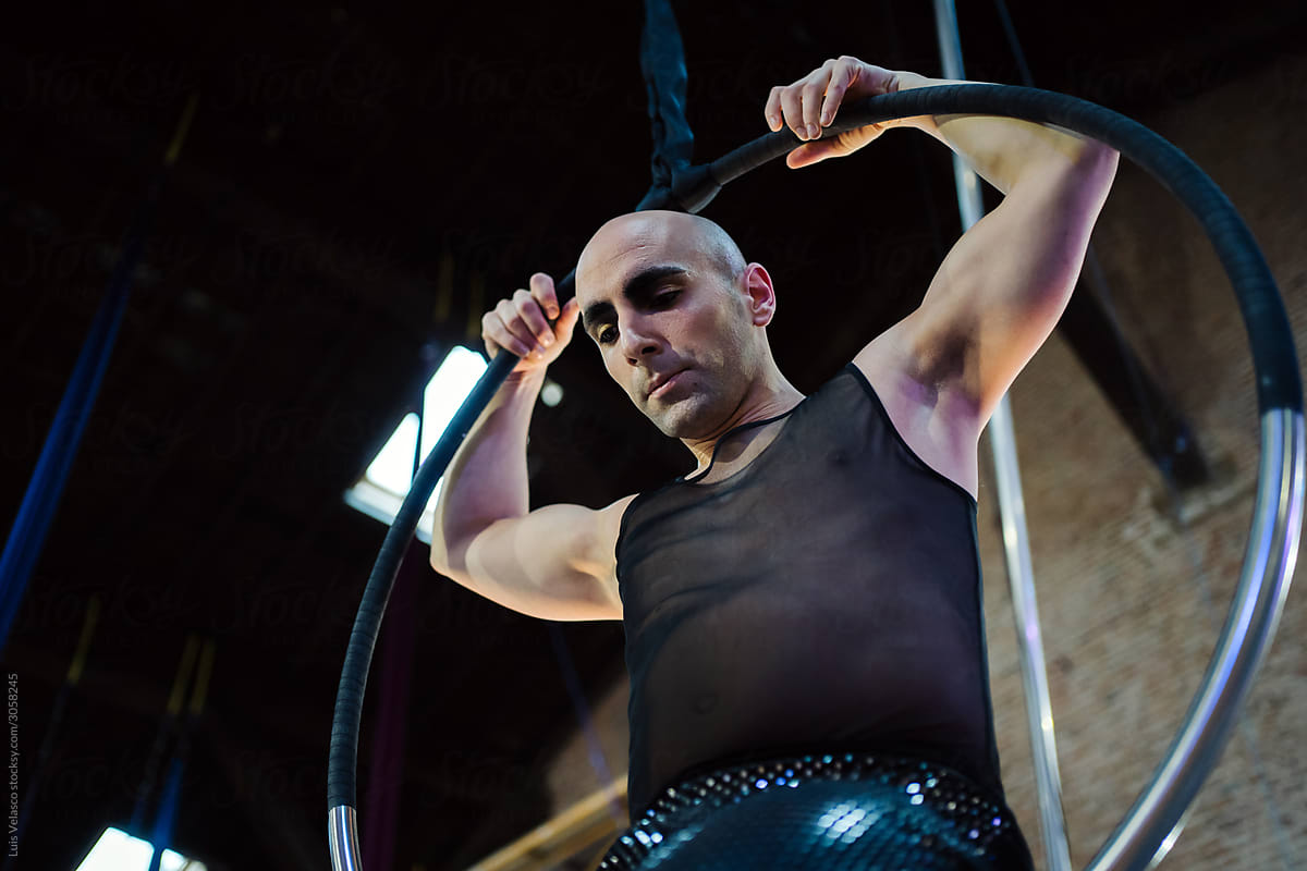 "Circus Artist Hanging On A Ring And Doing Acrobatics." by Stocksy ...