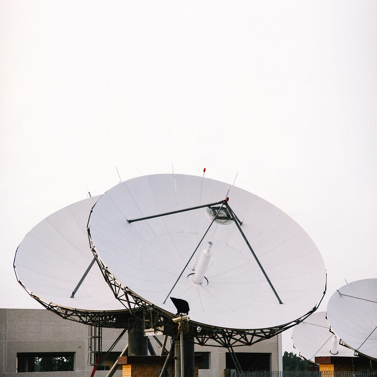 "Satellite Dish Antennas Under Sky" by Stocksy Contributor "Sky-Blue ...
