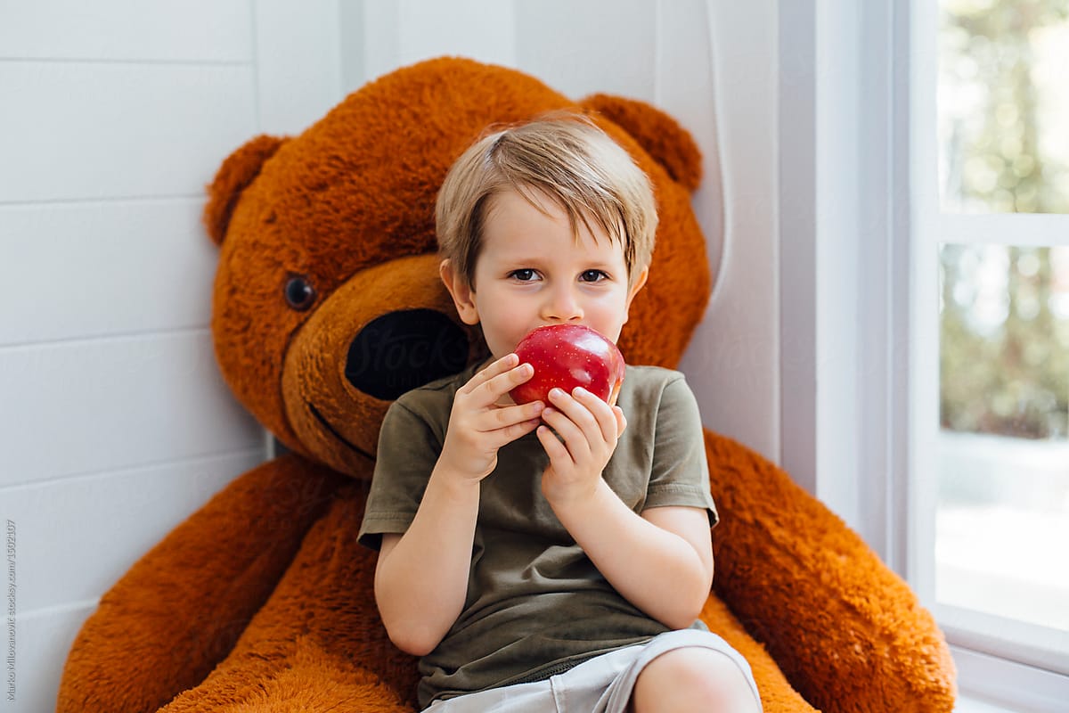 "Portrait Of A Boy Eating Toast With Jam" by Stocksy Contributor "Marko ...