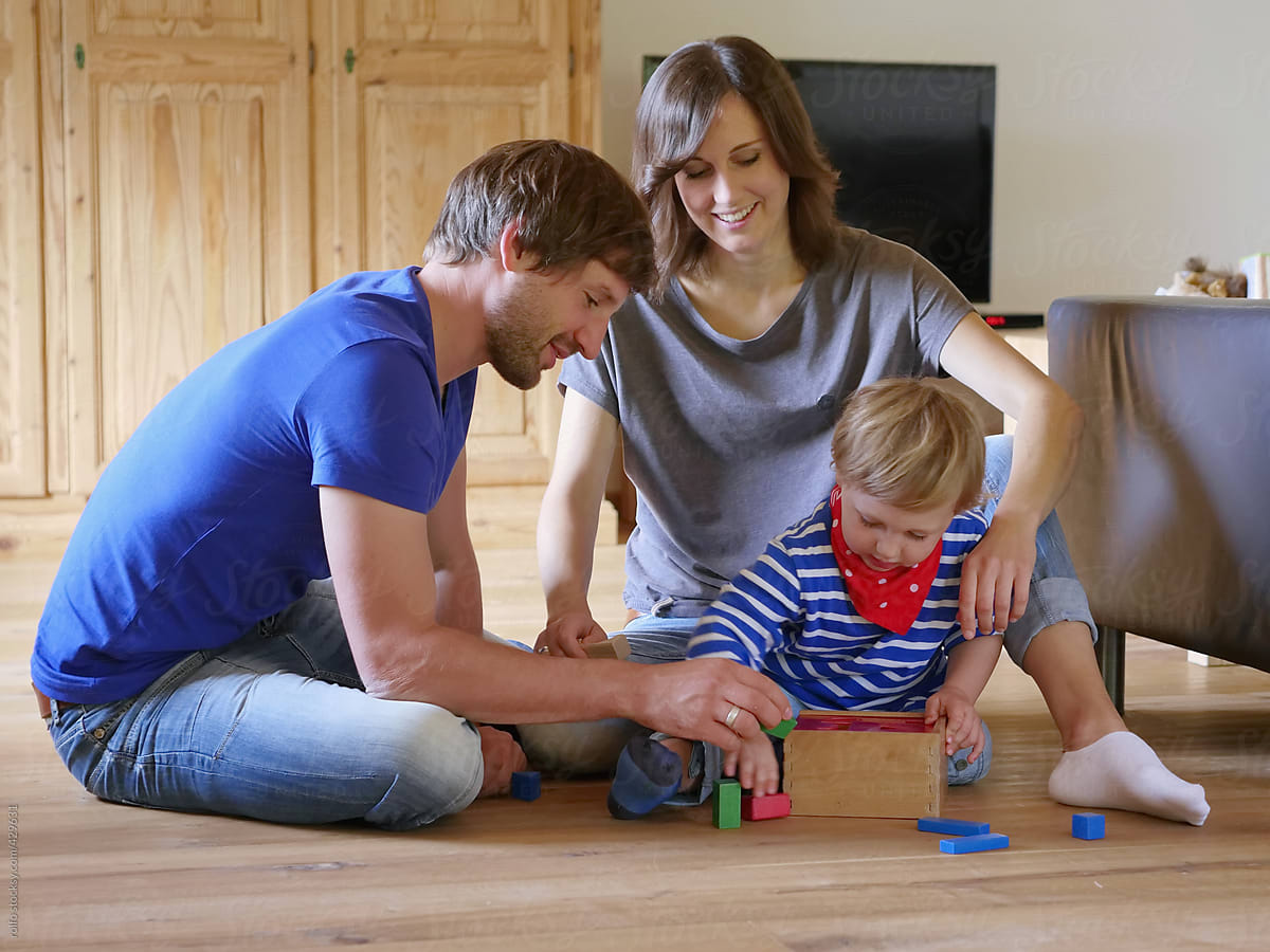 "Family Playing With Child Indoors" by Stocksy Contributor "Rolfo ...