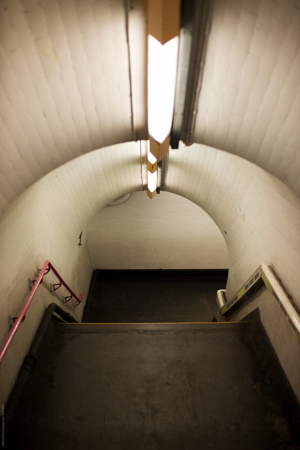 "Tube Entrance" by Stocksy Contributor "Gabriel J. Diaz" - Stocksy