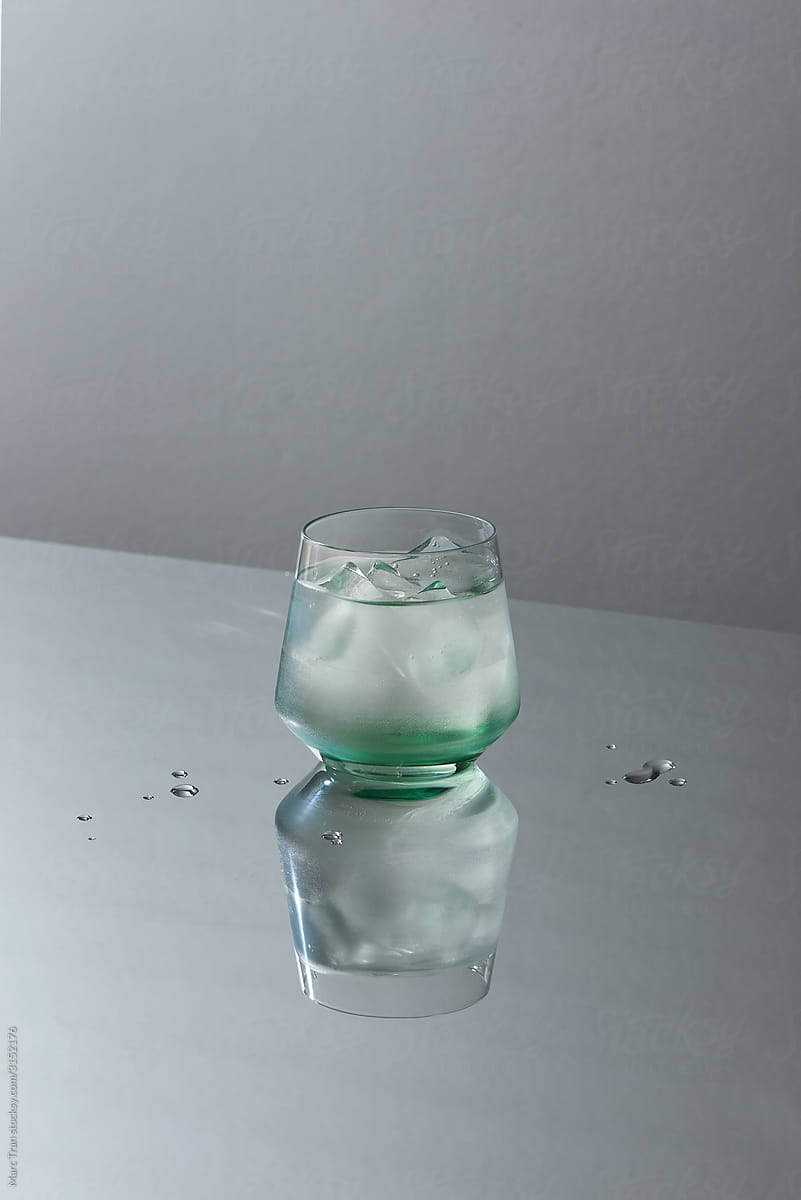 "Glass With Cold Water" by Stocksy Contributor "Marc Tran" - Stocksy