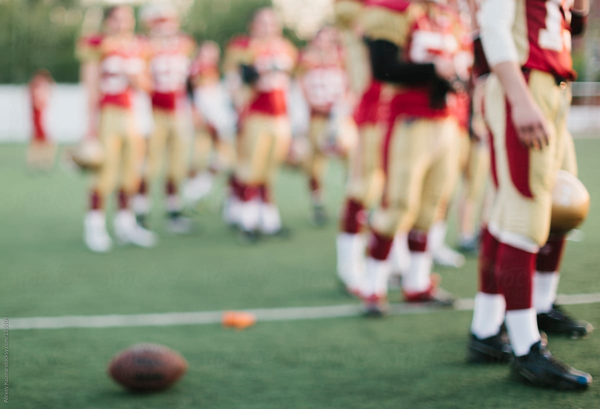 "American Football Players" by Stocksy Contributor "Alexey Kuzma" - Stocksy