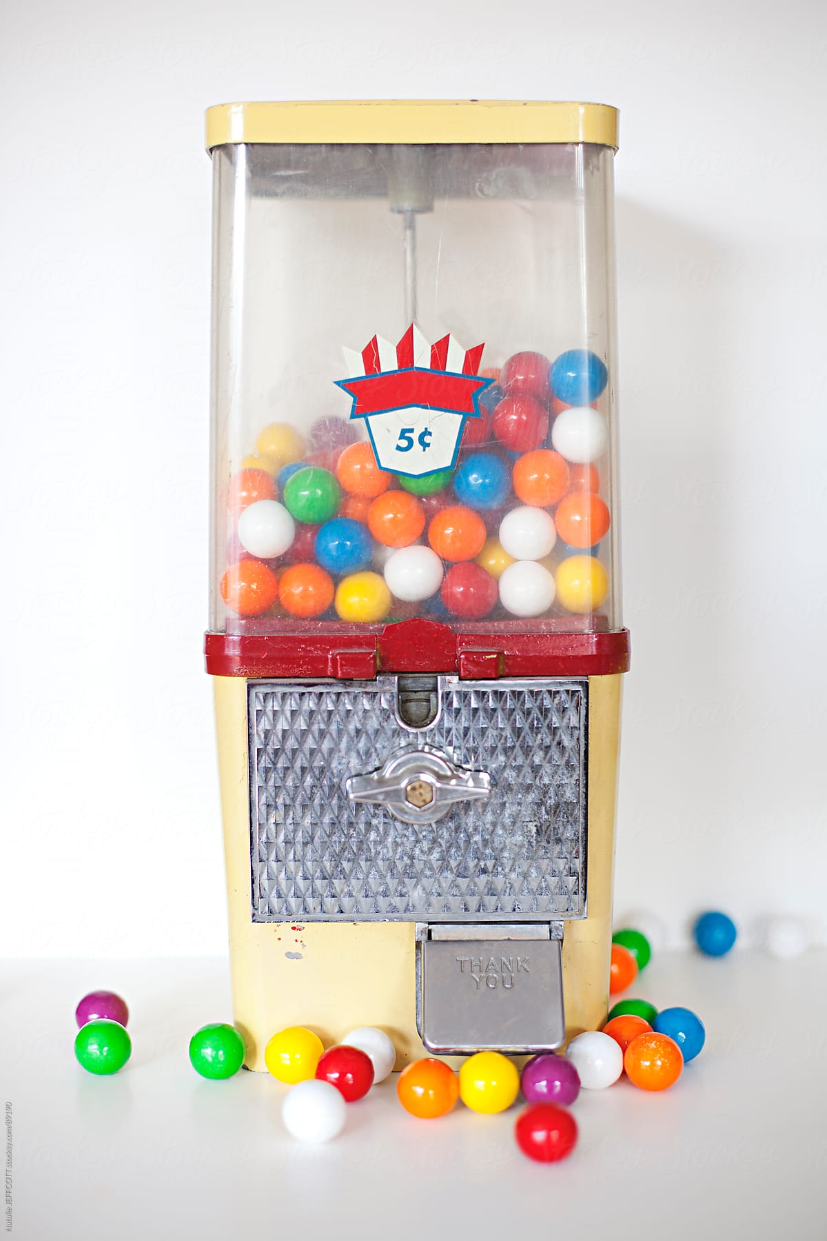 "Gum Ball Machine" by Stocksy Contributor "Natalie JEFFCOTT" - Stocksy