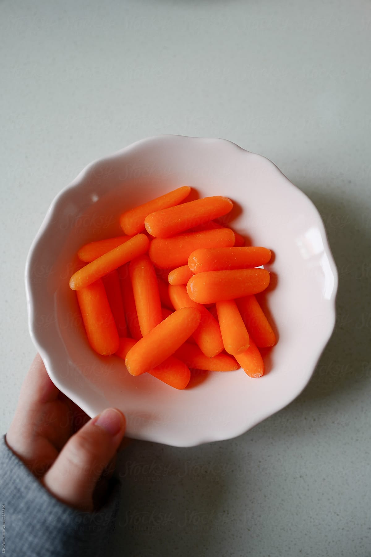 "Mini Carrot" by Stocksy Contributor "Rein Cheng" - Stocksy