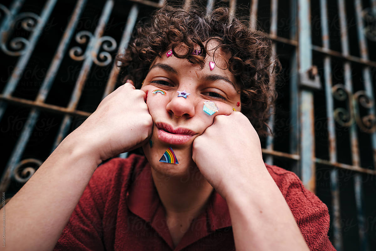 "Bored Gen Z Woman With Stickers On Face" by Stocksy Contributor "Lucas ...