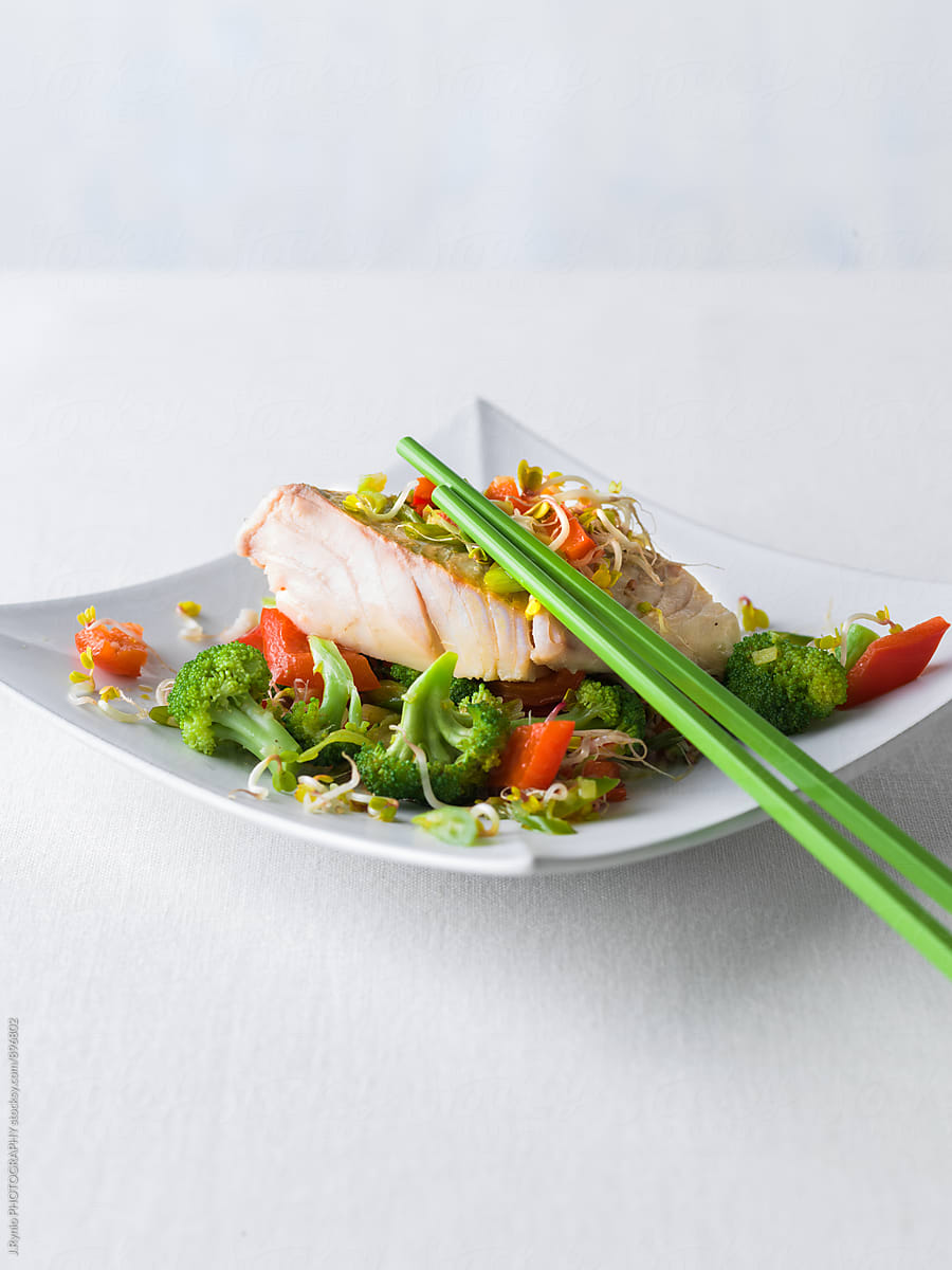 "Deliciously Plated Cod Fish With Fresh Vegetables And Herbs" by ...
