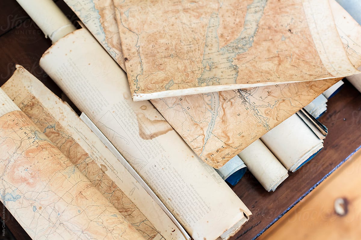 "Looking Down On Pieces Of Antique Maps And Scrolls." by Stocksy ...