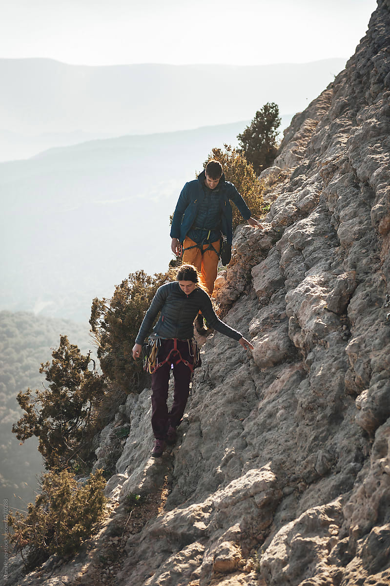 "Rock Climbers At Summit" by Stocksy Contributor "Manu Prats" - Stocksy