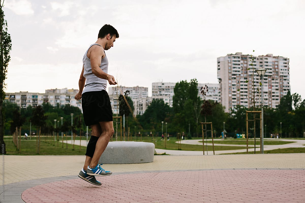 "Man Jumping On Rope In Urban Environment" by Stocksy Contributor ...