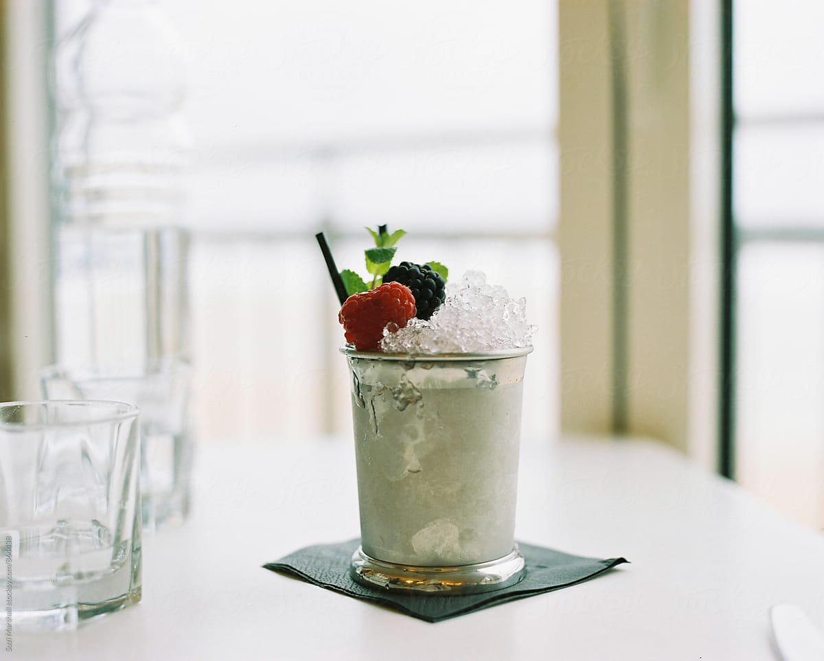 "Cocktail On A Table" by Stocksy Contributor "Suzi Marshall" - Stocksy