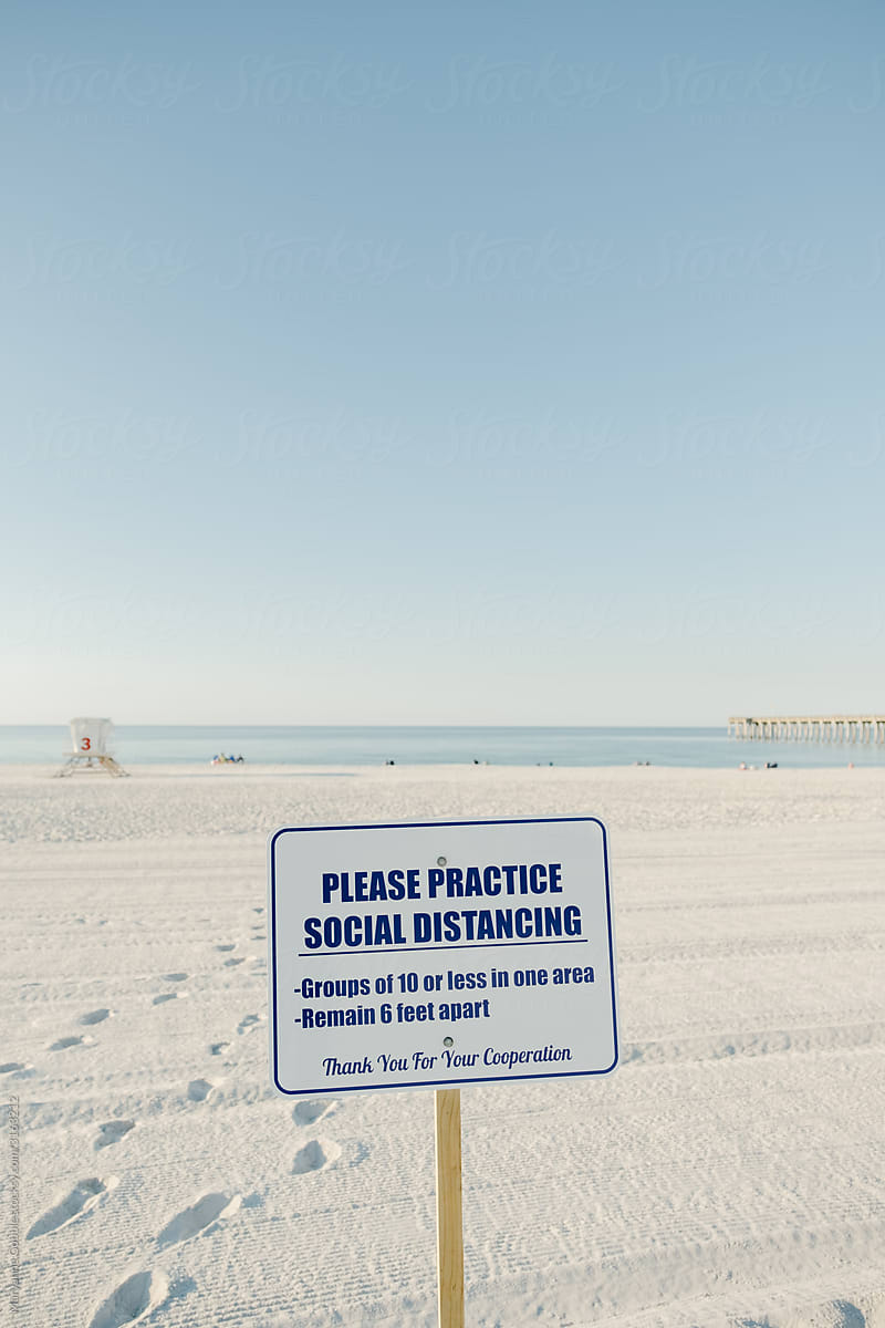 "Social Distancing Sign At Beach" by Stocksy Contributor "Maryanne ...