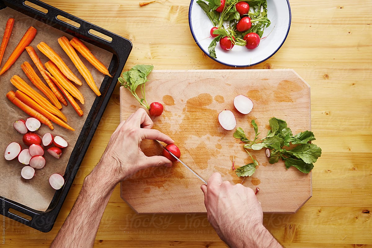 "Preparing Roast Vegetables" by Stocksy Contributor "Martí Sans" - Stocksy