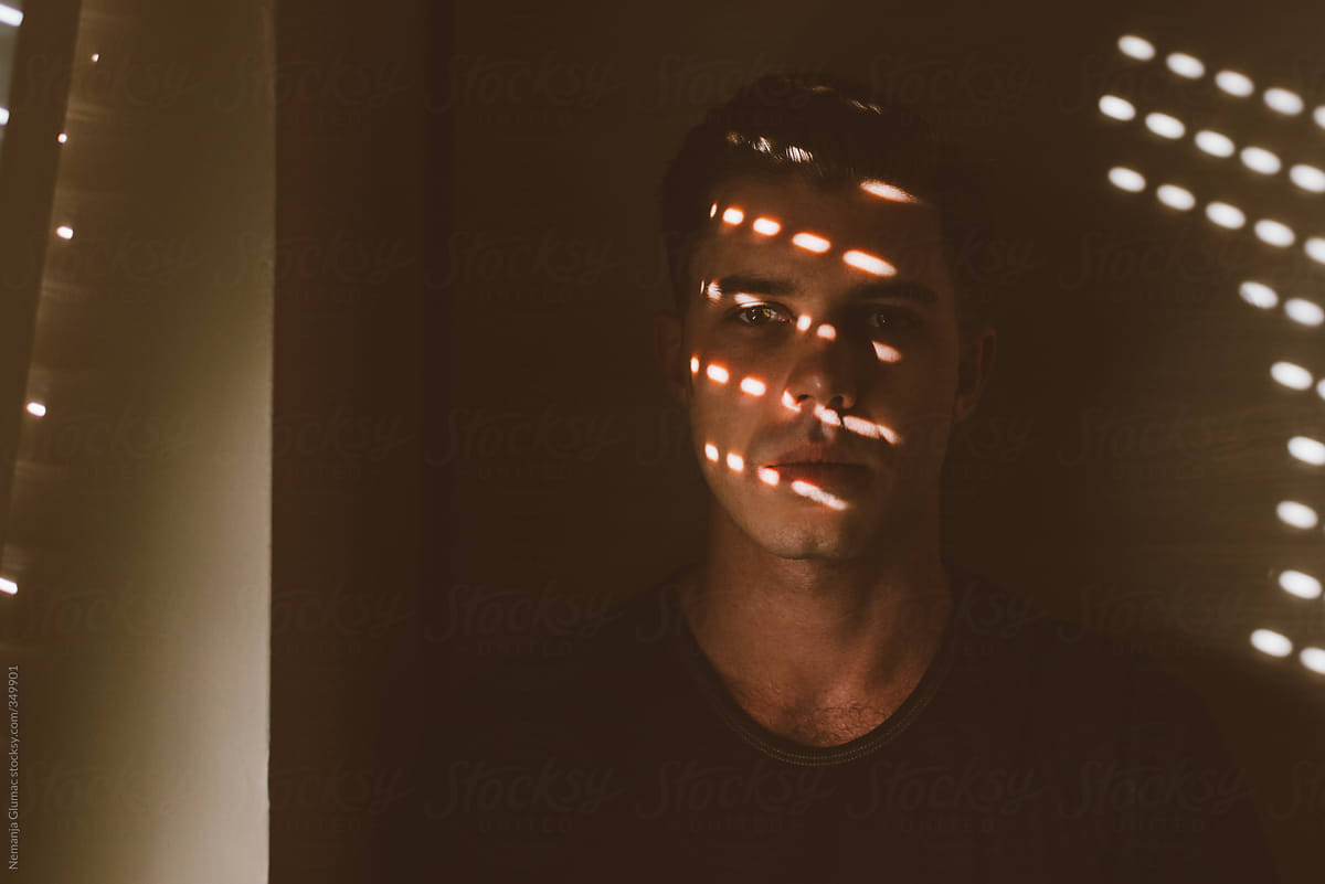 "Portrait Of A Young Man In Dark With Sunlight Dots On His Face" by ...