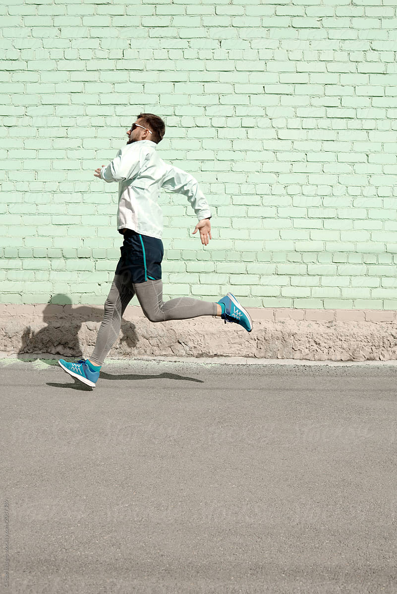 "Running In The Morning" by Stocksy Contributor "Clique Images" - Stocksy