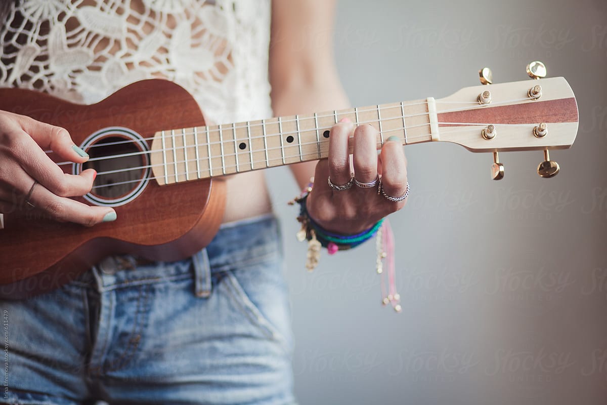 "Girl With Ukulele" by Stocksy Contributor "Irina Efremova" - Stocksy