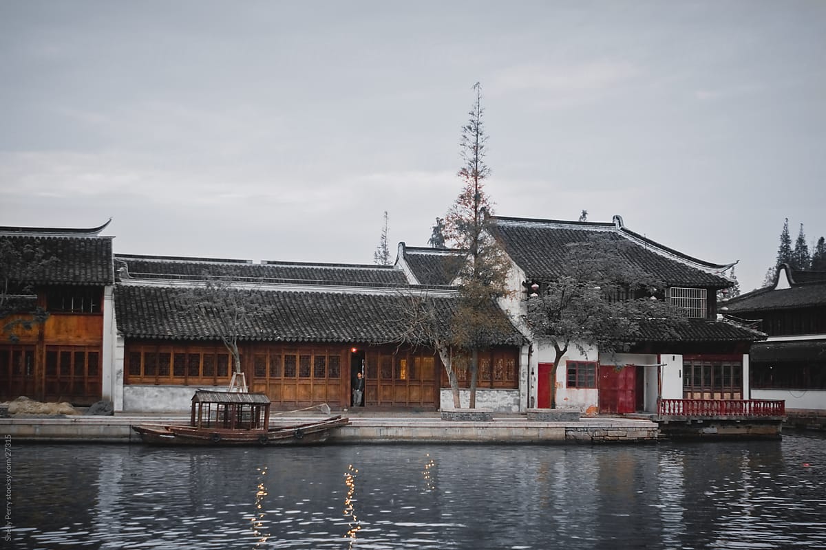 "Water Taxi Parked In Front Of Buildings In A Traditional Water Village ...