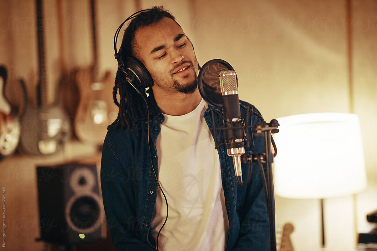 Young Black African American Man Singing In Music Studio By Flamingo Images