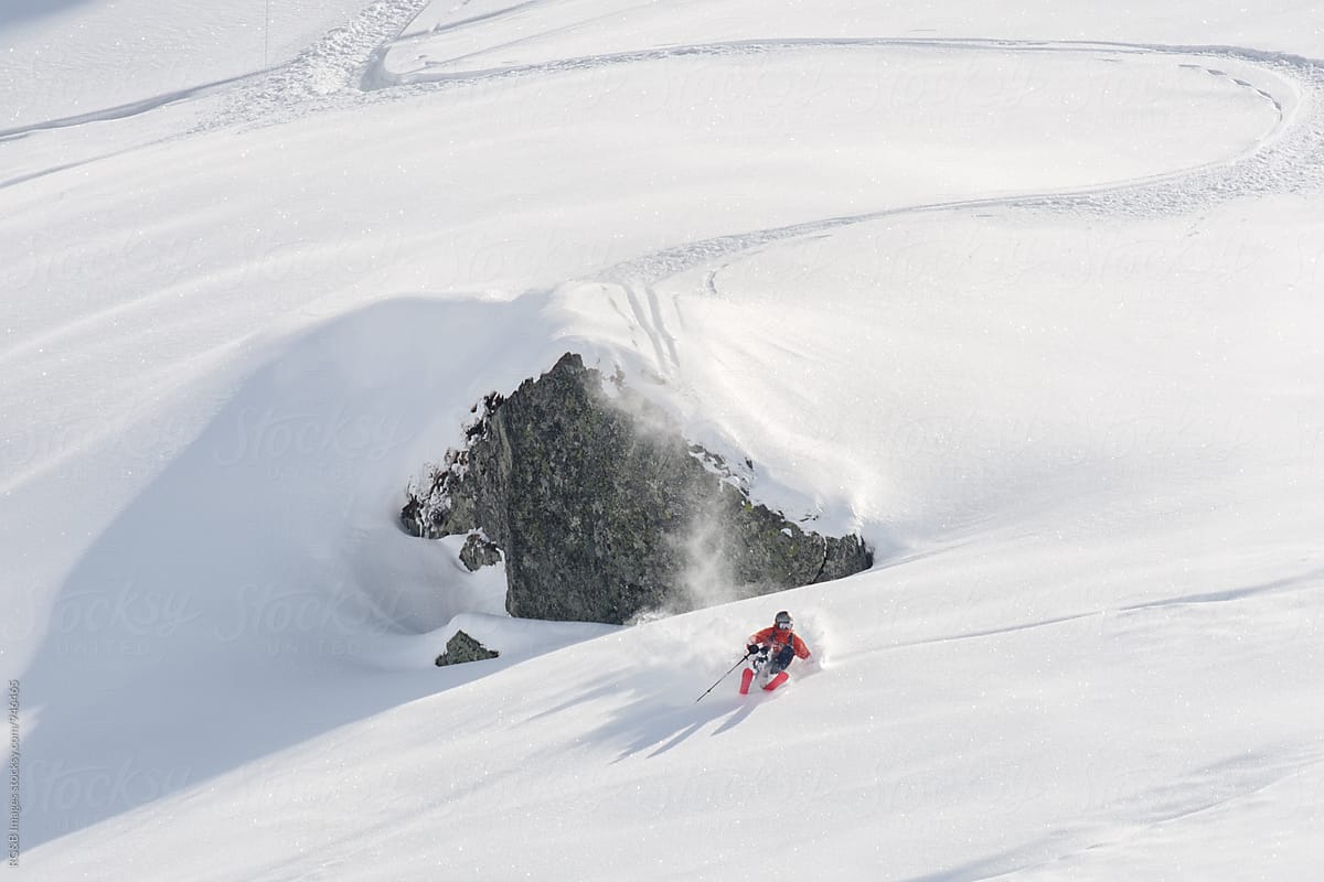 "Skier Making A Turn In Deep Snow" by Stocksy Contributor "Ibex.media ...