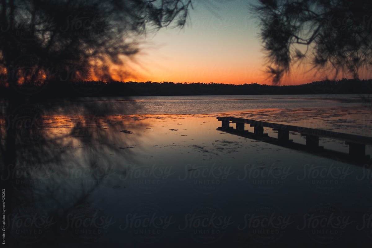 "Calm Lake In Sunrise" by Stocksy Contributor "ohlamour studio" - Stocksy