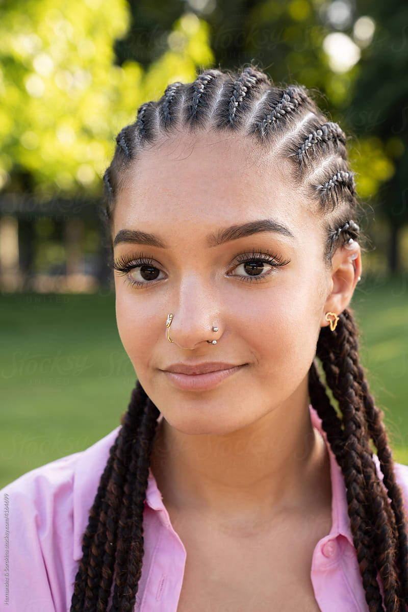 "Portrait Of Woman With Braids" by Stocksy Contributor "Hernandez ...