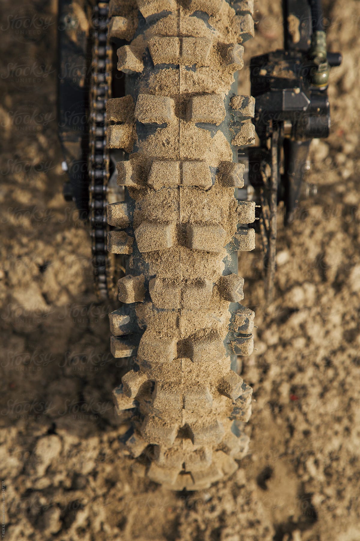 "The Bike Wheel Covered With Sand" by Stocksy Contributor "Danil Nevsky ...
