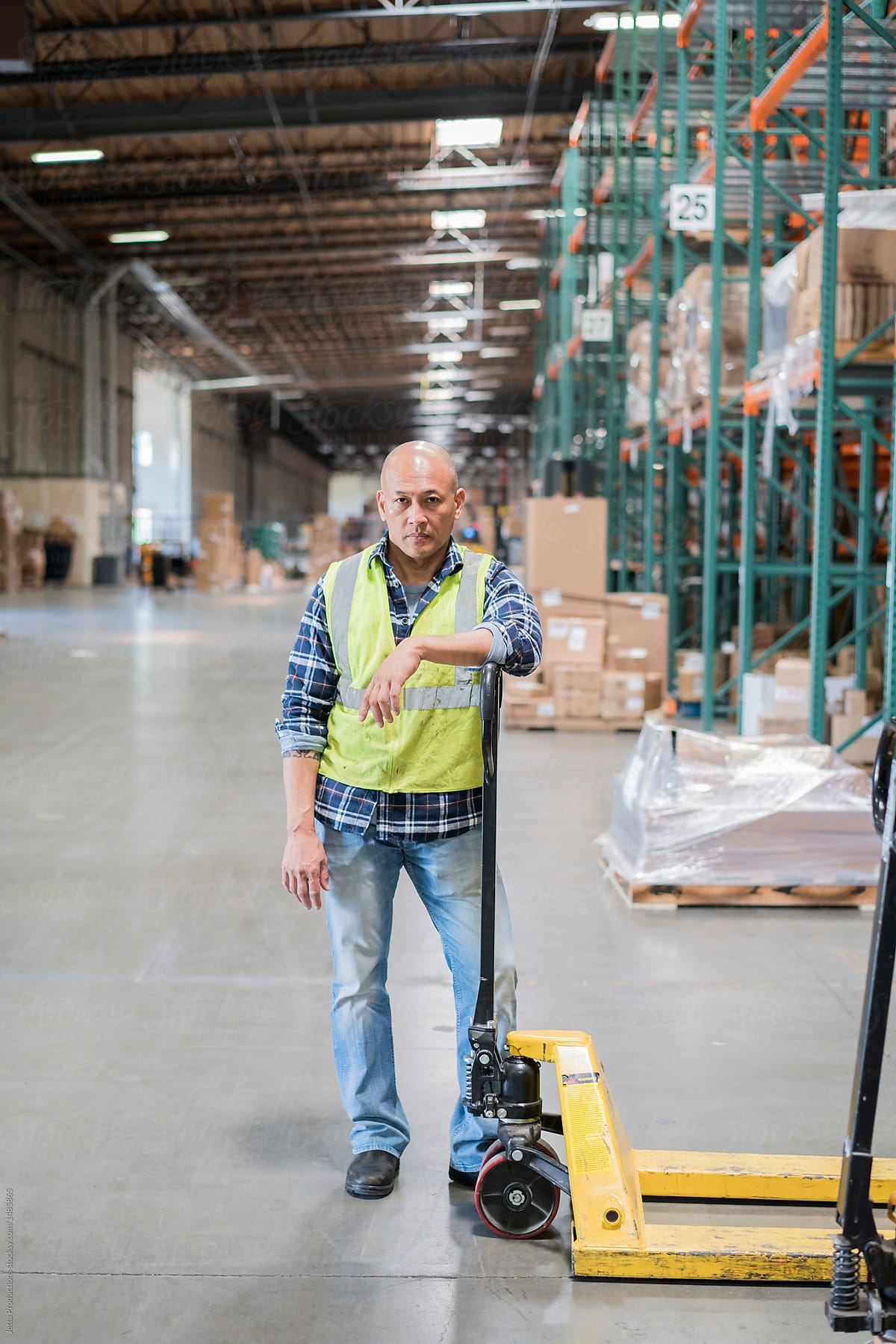 "Warehouse Worker Portrait." by Stocksy Contributor "Walter and Deb ...