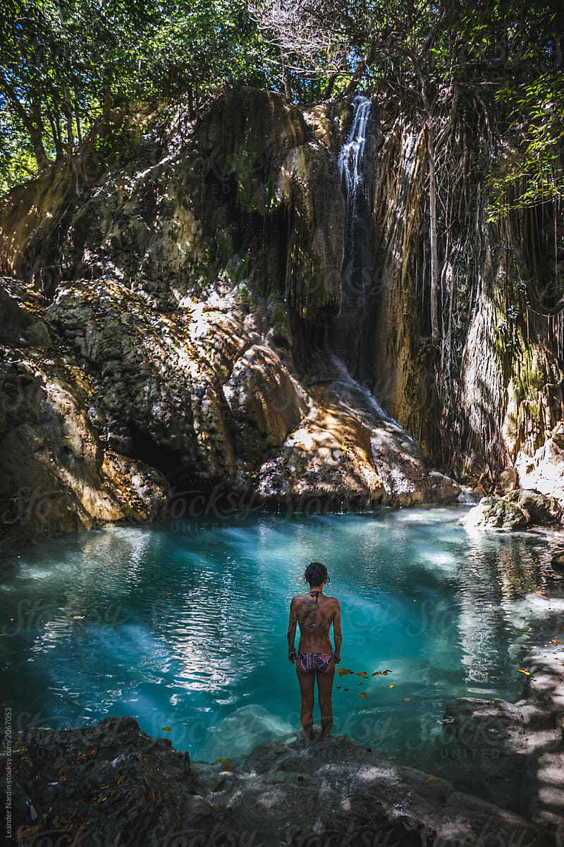 "Beautiful Woman Relaxing At A Waterfall" by Stocksy Contributor "Akela ...