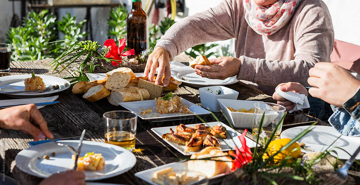 "Anonymous Hands Reaching For Food" by Stocksy Contributor "Kkgas ...