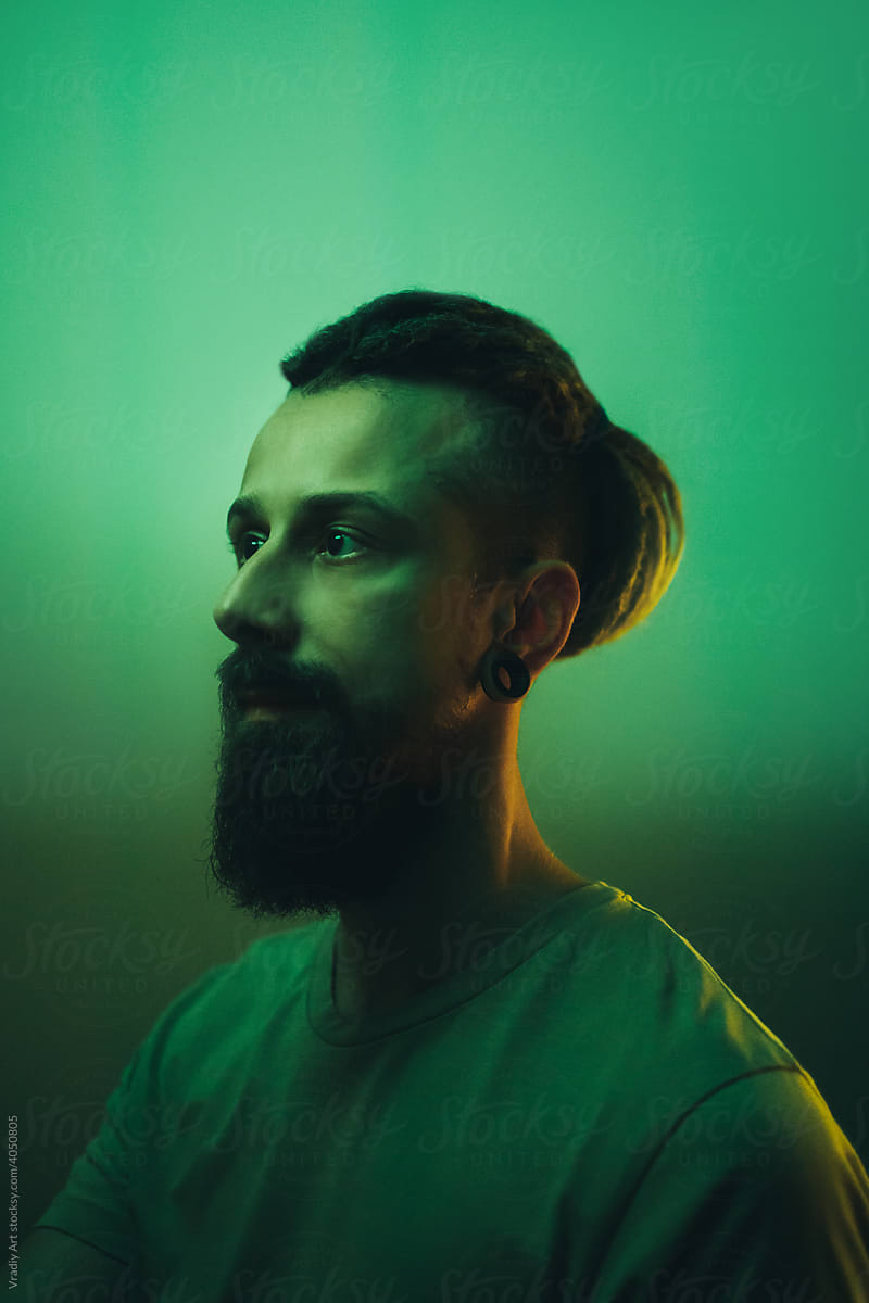 "Bearded Man In Green Neon Light" by Stocksy Contributor "Vradiy Art ...