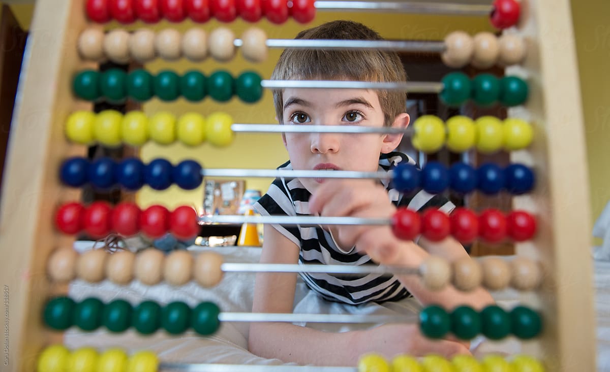 "Child Plays And Learns With An Abacus At Home" by Stocksy Contributor ...