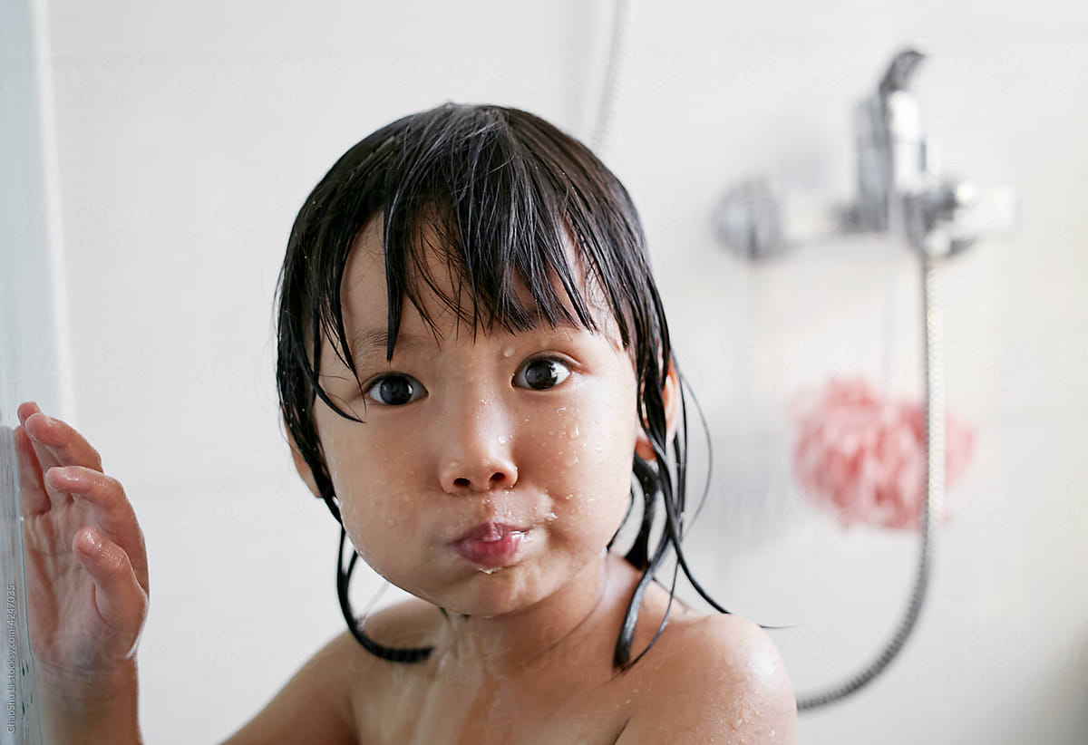 "Cute Asian Little Girl Playing In The Bath" by Stocksy Contributor ...