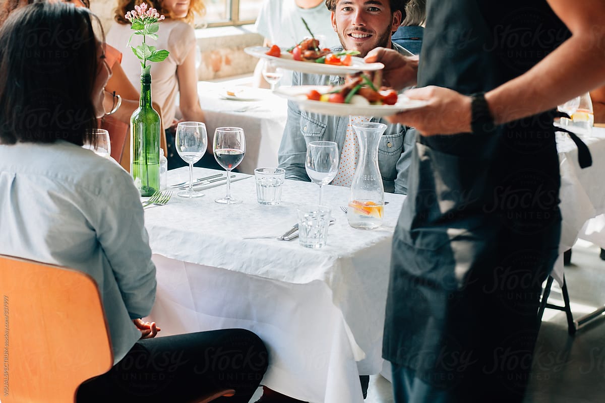 Young Waitress Laying Table Cloth In Restaurant Stock Waiter Setting